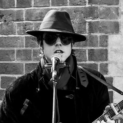 How to Start Harmonica Busking – Including All The Busking Gear You Need